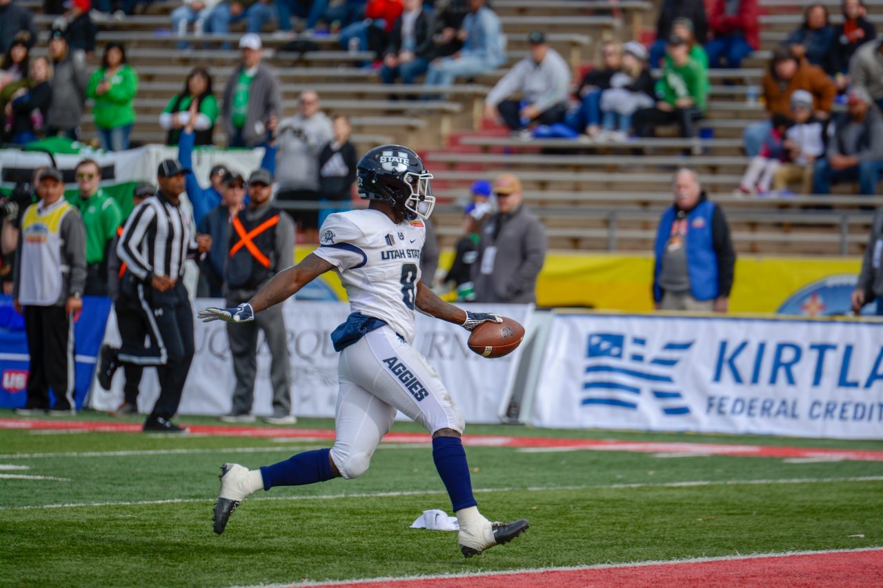 Udder domination: Utah State defeats North Texas 52-13 to claim New ...